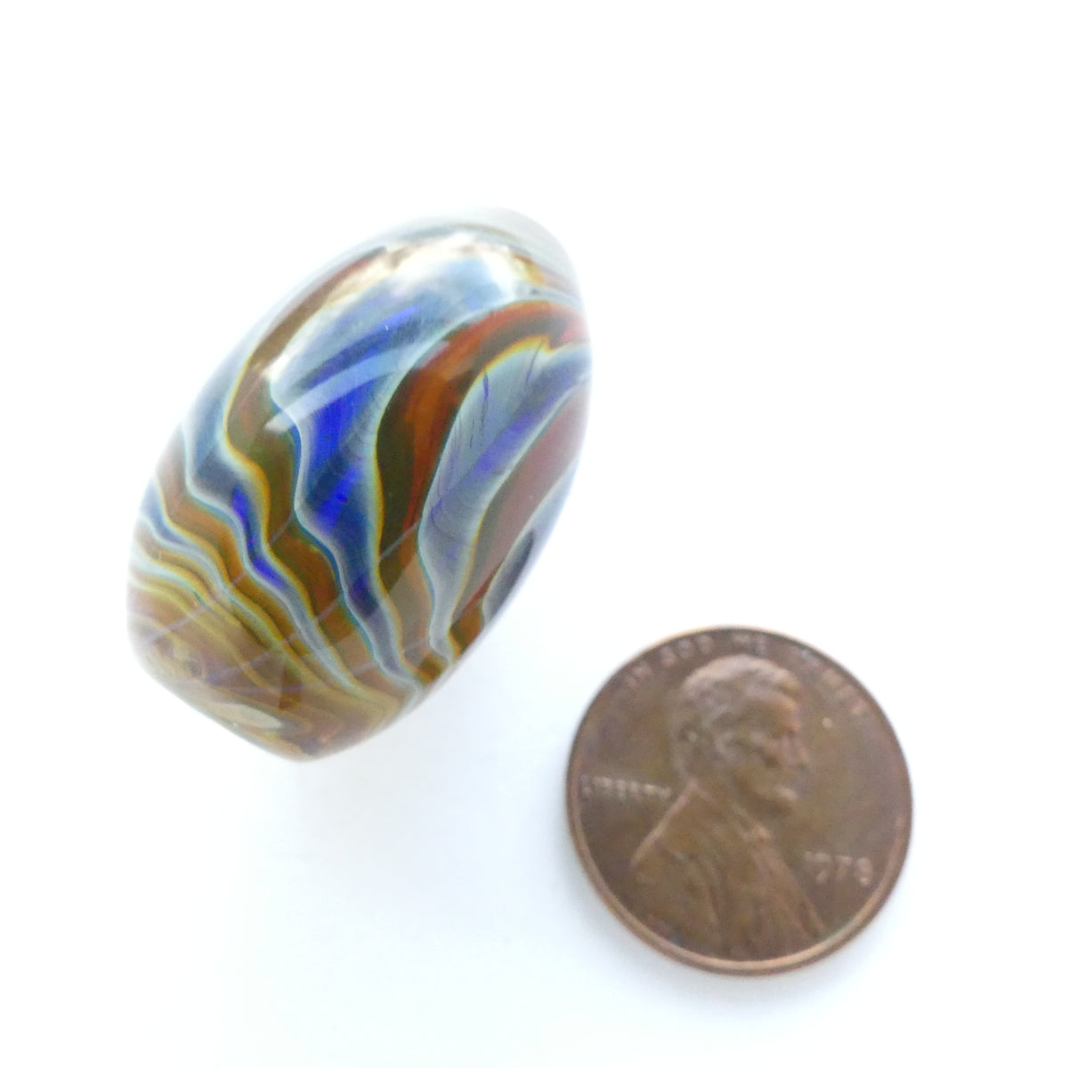 Tom Boylan, Small, Early Bead with Golden Amber Swirls on Deep Blue Ba ...