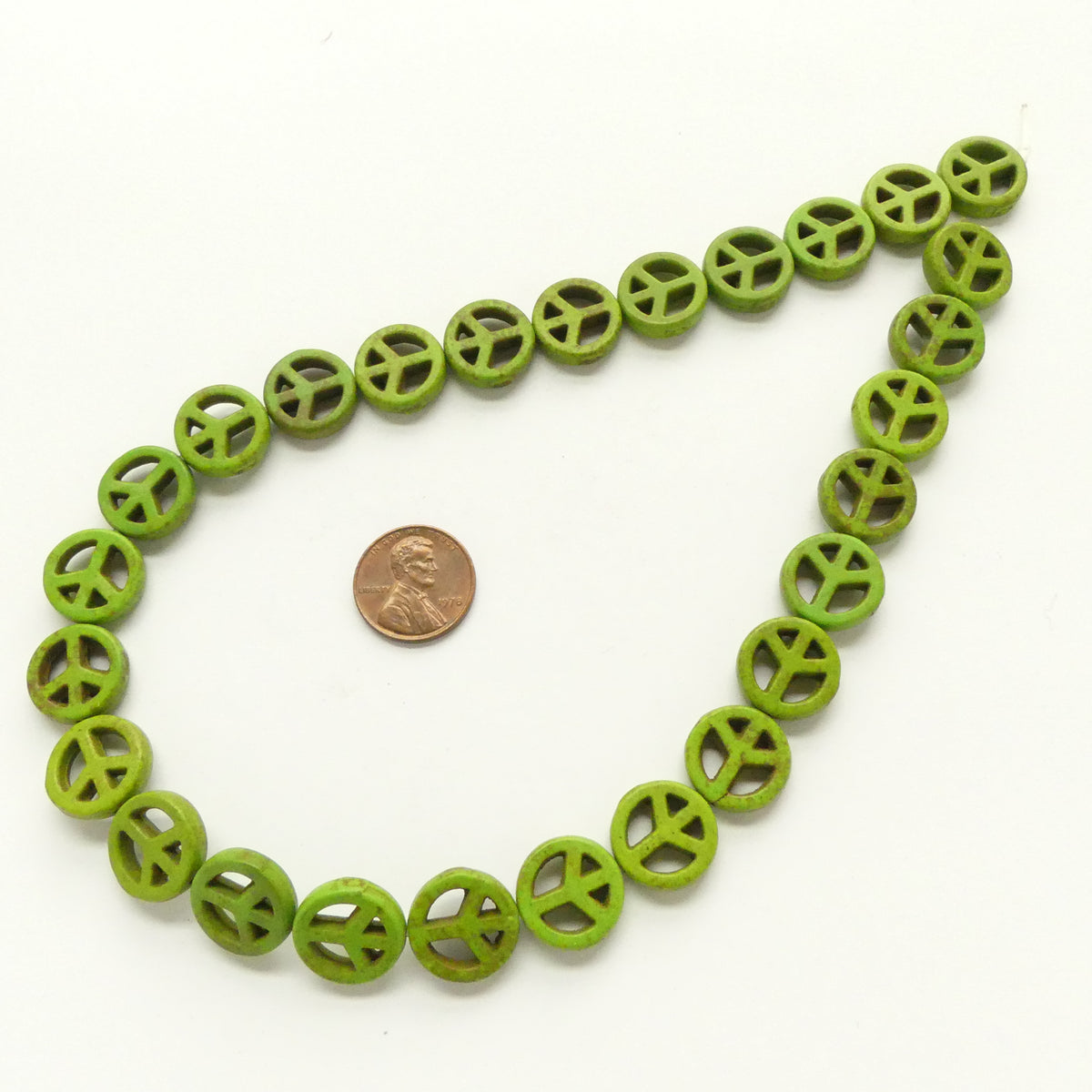 Magnesite Dyed Green, Peace Signs 15mm on 16-inch Strands – Beadazzled.com