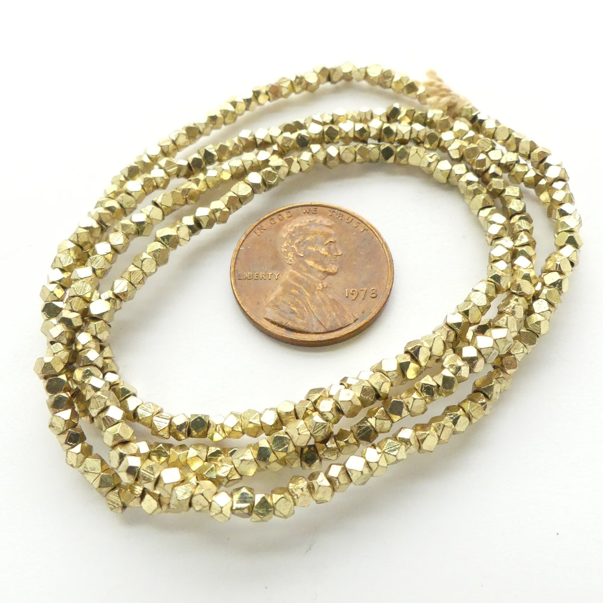 Brass, Cornerless Cube 2x2mm on 24-inch Strands – Beadazzled.com