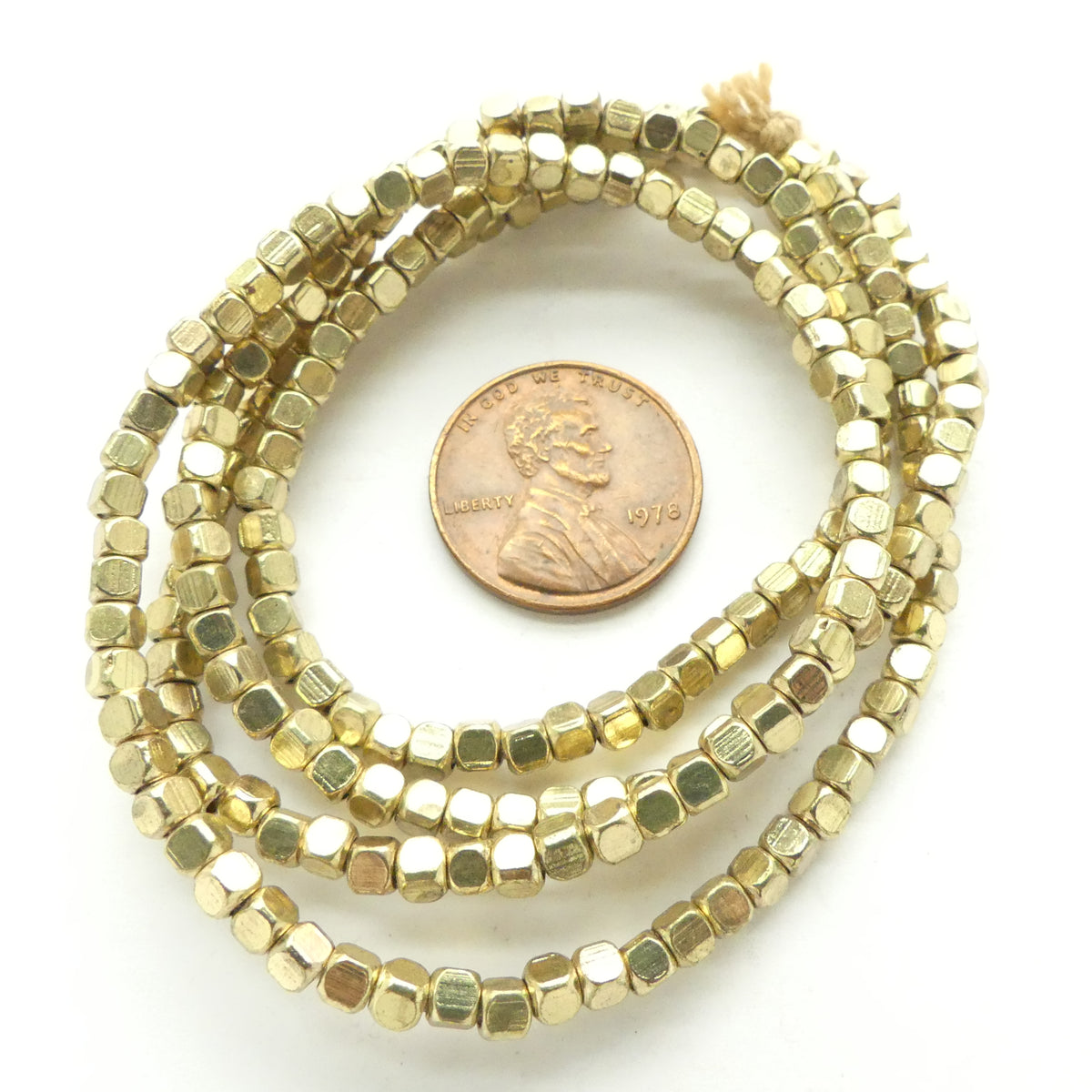 Brass, Cornerless Cubes 3x3mm on 24-inch Strand – Beadazzled.com
